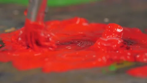 artist painter mixing red paint with bru... | Stock Video | Pond5
