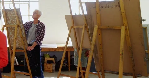 Artist practicing drawing on canvas 4k | Stock Video | Pond5