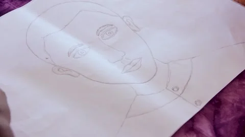 Artist shading outlines of a human portr... | Stock Video | Pond5