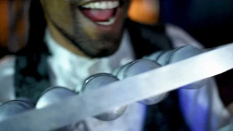 Artist using rattle in samba presentatio... | Stock Video | Pond5