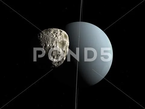 Artist's concept of how Uranus and its tiny moon Puck.: Graphic #65745213