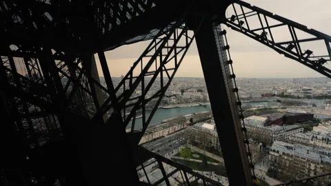 ascending shot up the Eiffel tower revea... | Stock Video | Pond5