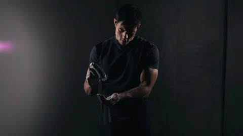 Asian Athlete Applying Chalk Powder on H... | Stock Video | Pond5