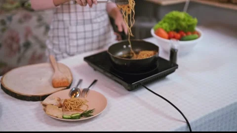 Asian beautiful woman enjoy cooking heal... | Stock Video | Pond5