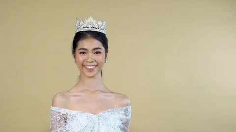 An Asian beauty pageant winner poses and... | Stock Video | Pond5
