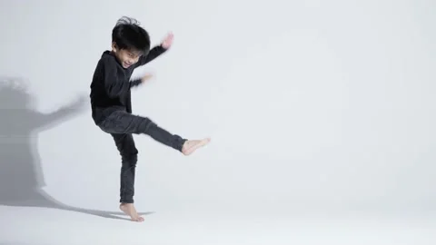 Asian boy practice dancing on the white ... | Stock Video | Pond5