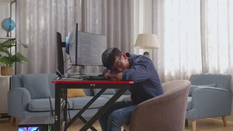 Asian Boy Programmer Sleeping While Crea... | Stock Video | Pond5