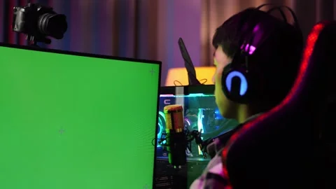Asian Boy Streamer Using Green Screen Pe... | Stock Video | Pond5