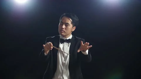 Asian Man Conductor Stock Footage ~ Royalty Free Stock Videos | Pond5