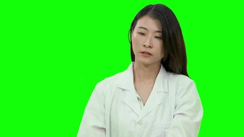 Asian female doctor squeezing syringe on... | Stock Video | Pond5