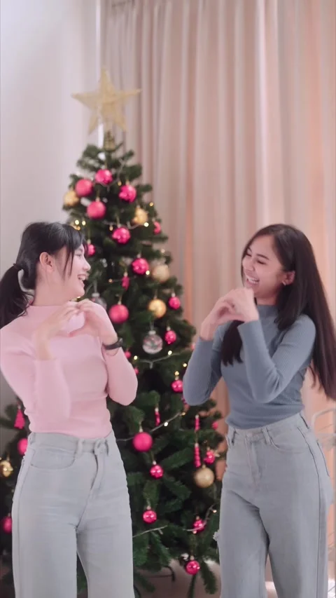 Asian female friends joyfully dance at t... | Stock Video | Pond5