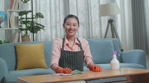 Asian Female Housekeeper With An Apron S... | Stock Video | Pond5