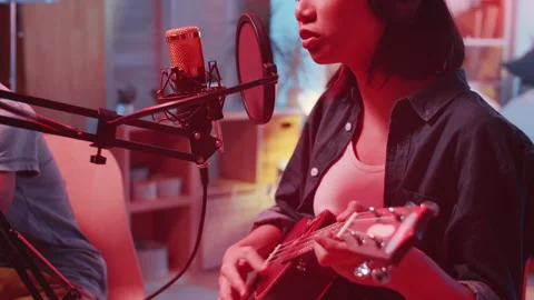Asian Female Singer Recording Song with ... | Stock Video | Pond5
