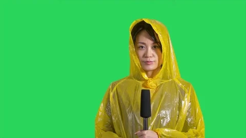 Asian female weather reporter on green s... | Stock Video | Pond5