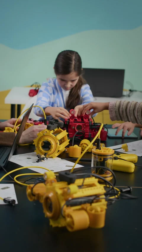 Asian Girl Building Robot Model during R... | Stock Video | Pond5