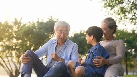 asian grandpa grandma and grandchild hav... | Stock Video | Pond5