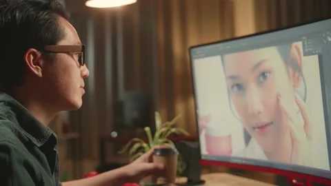 Asian Male Digital Editor Drinking Coffe... | Stock Video | Pond5