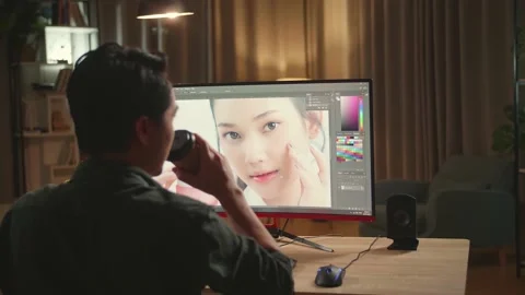 Asian Male Digital Editor Drinking Coffe... | Stock Video | Pond5