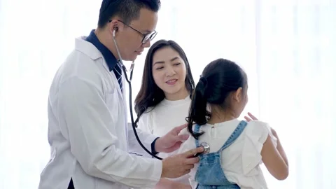 Asian male Pediatrician using stethoscop... | Stock Video | Pond5