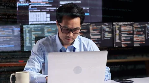 Asian Male Programmer Writing Code By A ... | Stock Video | Pond5