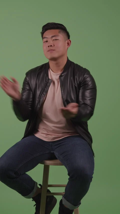 Asian Man Clapping His Hands in Front of... | Stock Video | Pond5