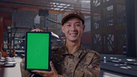 Asian Man Soldier Smiling And Showing Gr... | Stock Video | Pond5
