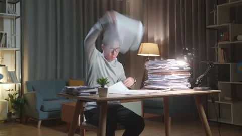 Asian Man Throwing Paper And Having Head... | Stock Video | Pond5