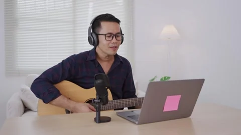 Asian man youtuber live streaming perfor... | Stock Video | Pond5