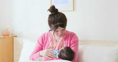 Asian Breastfeeding Stock Footage ~ Royalty Free Stock Videos | Pond5