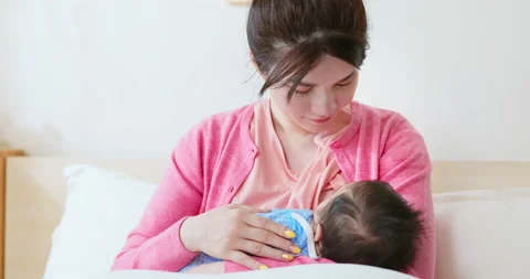 Asian Breastfeeding Stock Footage ~ Royalty Free Stock Videos | Pond5