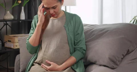 Asian pregnant woman having nausea and h... | Stock Video | Pond5
