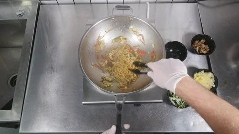 Asian restaurant kitchen, chef cooking f... | Stock Video | Pond5
