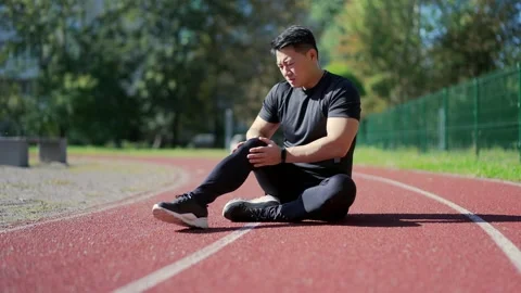 Rubbing Leg Stock Videos – Royalty-Free HD & 4K Videos