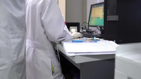 Asian scientist cut sample for experimen... | Stock Video | Pond5