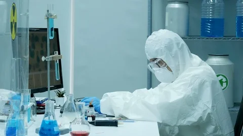 Asian Scientist working together at labo... | Stock Video | Pond5