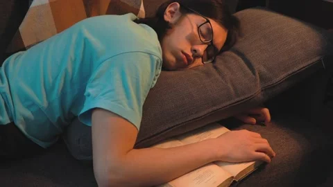 Asian Tired Guy Is Sleeping at The Sofa... | Stock Video | Pond5