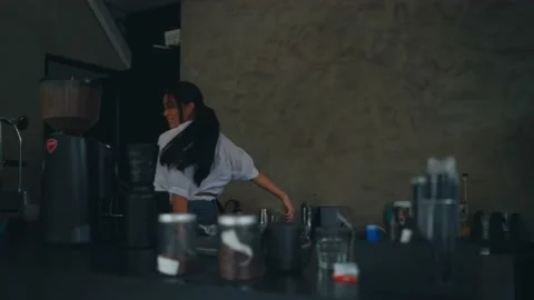 an Asian woman dancing very happily in a... | Stock Video | Pond5