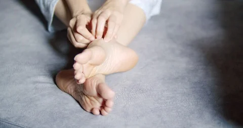 Scratching Feet Stock Videos – Royalty-Free HD & 4K Videos