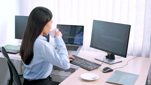 Asian woman programmer typing source cod... | Stock Video | Pond5