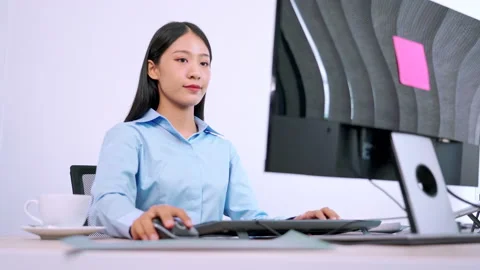 Asian woman programmer typing source cod... | Stock Video | Pond5