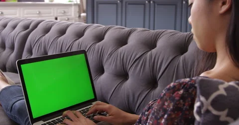 Asian Woman Using Green Screen Laptop At... | Stock Video | Pond5