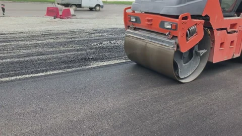 Asphalt roller leveling road pressure. R... | Stock Video | Pond5