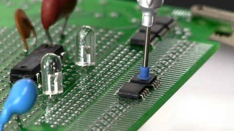 Assemble circuit with surface mount IC b... | Stock Video | Pond5