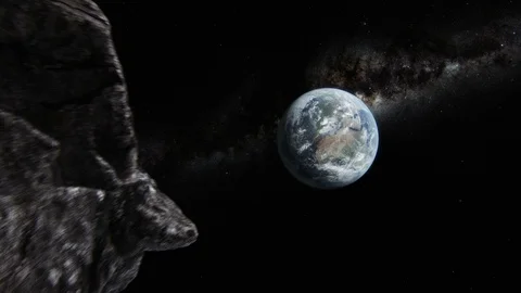 Asteroid approaching planet Earth. 4k | Stock Video | Pond5
