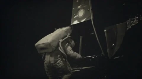 Astronaut Armstrong lands the lunar ladd... | Stock Video | Pond5