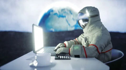 Astronaut on the moon working with noteb... | Stock Video | Pond5