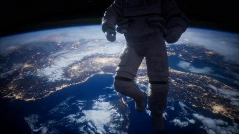 Astronaut in outer space against the bac... | Stock Video | Pond5