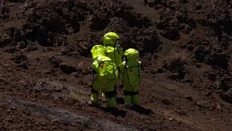 Astronaut training on ground of planet m... | Stock Video | Pond5