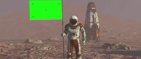 Astronaut walking on the mars with green... | Stock Video | Pond5