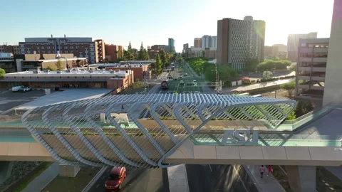 ASU elevated walking bridge above road. ... | Stock Video | Pond5